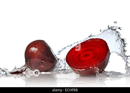 red beet with water splash isolated on white Stock Photo - Alamy