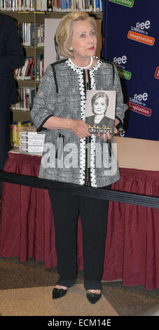 Hillary Clinton signs copies of her new book "Hard Choices" at the Book ...
