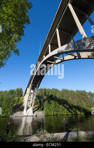 30 meters high concrete arch road bridge over river Leppävirta ...