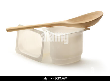 Empty plastic yogurt pots with wooden spoon Stock Photo - Alamy