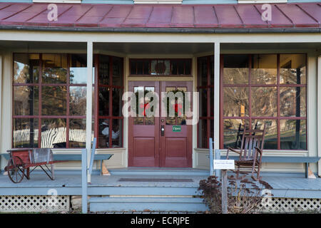 Front porch of an old country store with vintage signs and other ...