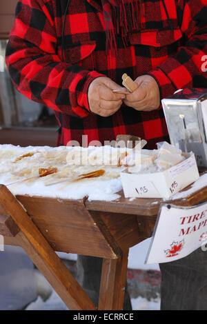 The process of making maple taffy using canadian Maple Syrup and snow ...