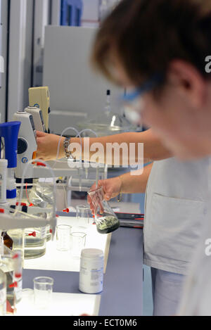 Lab technicians examining products of a sugar mill Stock Photo - Alamy