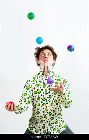 Five young men juggling with balls and clubs at Larcomar in the ...