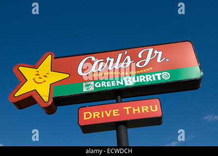 A Carl's Jr star logo sign is seen at the fast food restaurant, Friday ...