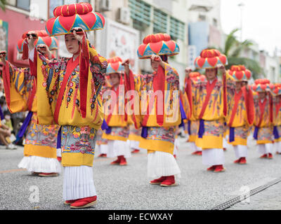 Parade of traditional ryukyu dancers wearing bingata kimonos and ...
