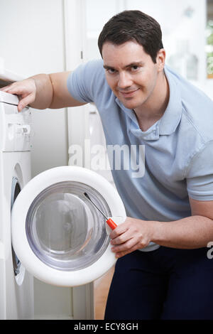 Engineer Mending Domestic Washing Machine Stock Photo - Alamy