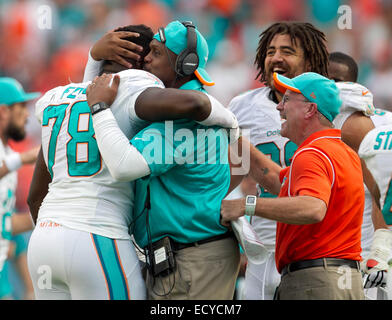 Miami Dolphins defensive line coach Austin Clark stands on the ...