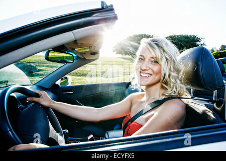 Woman Driving a Convertible Stock Photo - Alamy
