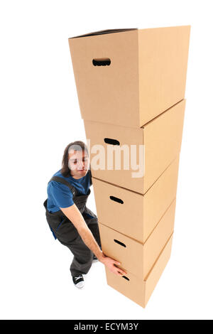 Mover with big stack of heavy boxes Stock Photo - Alamy