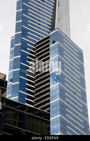 Modern architectural structure in a glass facade with the reflection of ...
