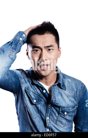 Image of frustrated and worried young man shaking hands, trying to ...