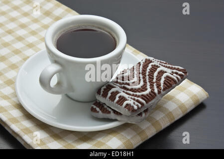 Glass cup of coffee and Chocolate chip cookies on the table Stock Photo ...