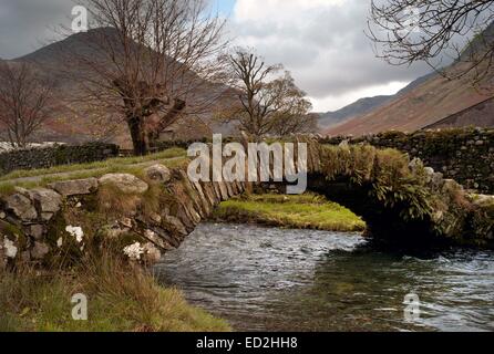 The Old Packhorse Bridge over Mosedale Beck behind the Wasdale Head Inn ...