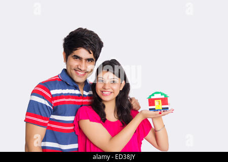 2 indian couple Dummy House showing Stock Photo - Alamy