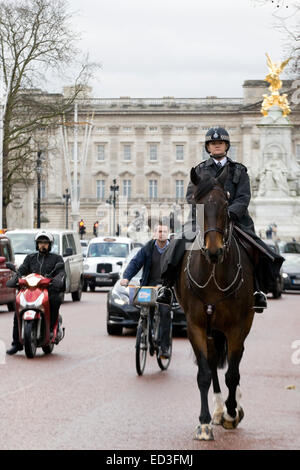 An armed motorcycle police officer of the Special Escort Group SEG ...
