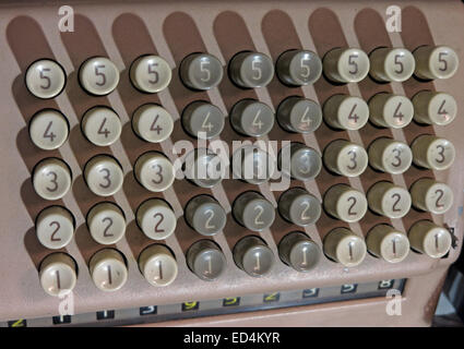 Comptometer - key-driven mechanical calculator showing numbered button keys in monochrome Stock ...
