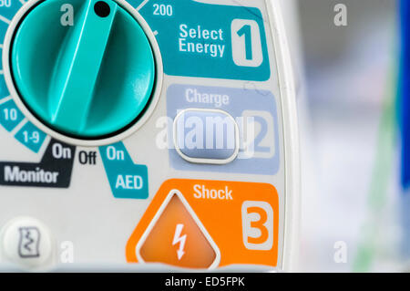 Defibrillator sitting ready for use on a hospital Crash Trolley Stock ...