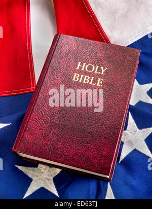 American flag and holy bible book on mirror background. Symbol of the ...