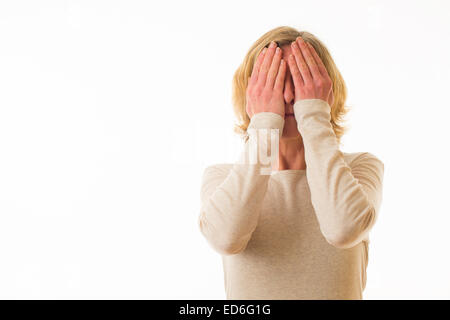 Shame and embarrassment : A forty year old caucasian woman hiding her ...