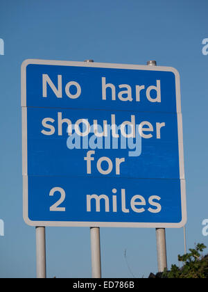Motorway sign declaring "No hard shoulder for 2 miles Stock Photo - Alamy