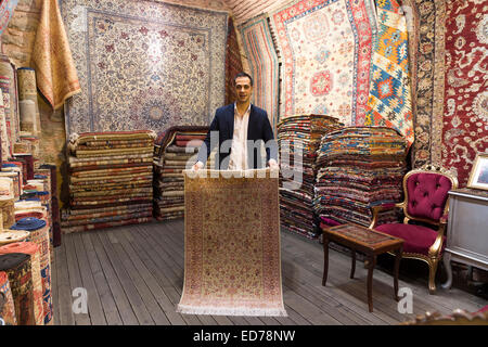 Carpet and rug salesman inside the Grand Bazaar in Istanbul Turkey ...
