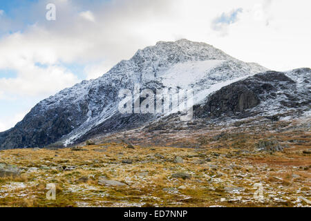 The snow-covered mountain of Tryfan in Snowdonia, seen during a winter ...