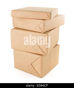 parcels boxes with kraft paper, on wooden table on grey background ...