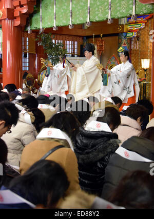 Shinto priests at a ritual purification ceremony, Fushimi Inari Taisha ...