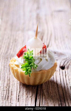 Canape - Pastry base with savory spread topping and salami Stock Photo ...