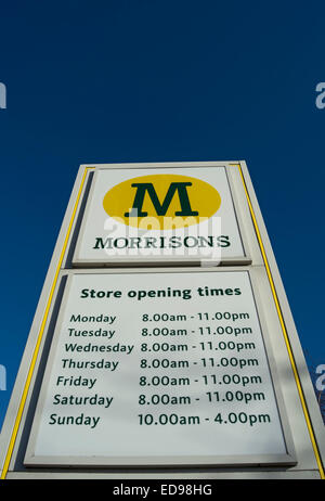 morrisons store opening times sign Stock Photo - Alamy