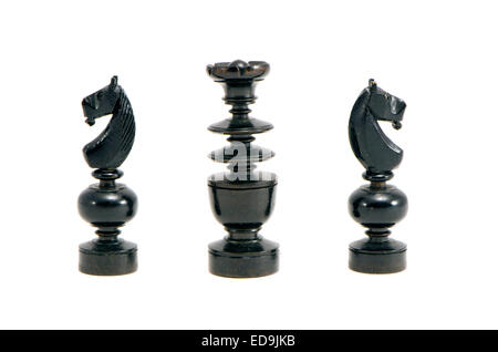 A chess horse and a toy horse on a white background Stock Photo - Alamy