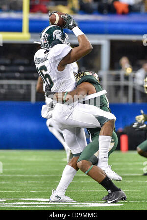 With Michigan State receiver Aaron Burbridge looking on, receiver Keith ...