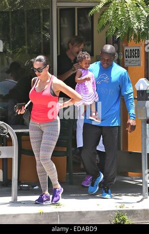 Reggie Bush with his wife Lilit Avagyan and baby daughter Briseis leave ...