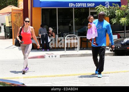 Reggie Bush with his wife Lilit Avagyan and baby daughter Briseis leave ...