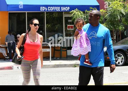 Reggie Bush with his wife Lilit Avagyan and baby daughter Briseis leave ...