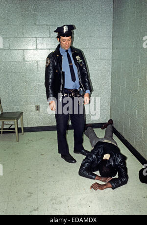 28th Precinct, New York policeman with guns drawn in Harlem 70s, USA ...