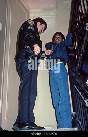 28th Precinct, New York policeman with guns drawn in Harlem, USA 70s ...