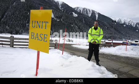 Obertilliach, Austria. 14th Dec, 2014. Security guards stand in front ...