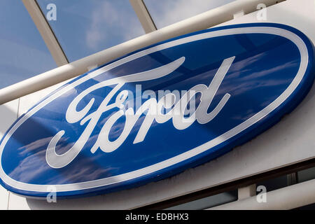 Ford Motor Company brand logo on bright blue sky background located on ...