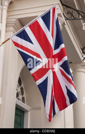 Union Jack Flag against Building Facade Stock Photo - Alamy
