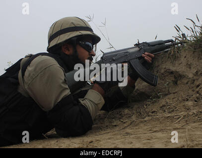 Pakistani Security Force patrol along the Pakistan-India border area of ...