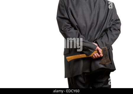 Man in suit hiding an axe behind his back isolated on white background ...