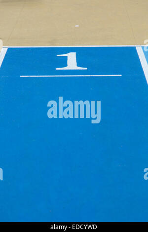 Numbers at finish line of 60 meters running field Stock Photo - Alamy