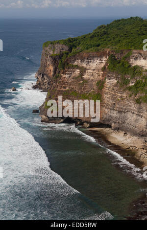 Limestone cliffs at Uluwatu Bukit peninsula, Bali Indonesia Stock Photo ...