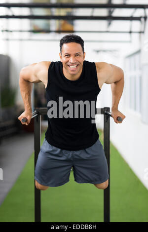 Middle-aged fit muscular man training in a sports gym Stock Photo - Alamy