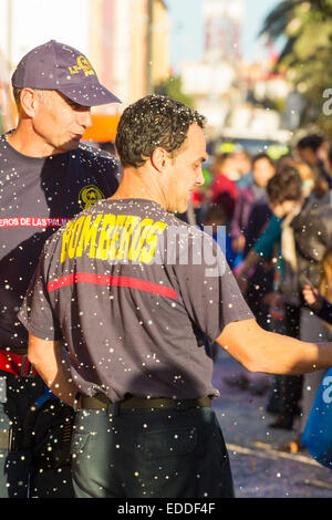 Fireman, firefighter (Bombero) on duty during fiesta street parade in ...