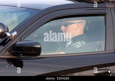 Greenfield Wisconsin Police Department Police Officer exiting his squad ...