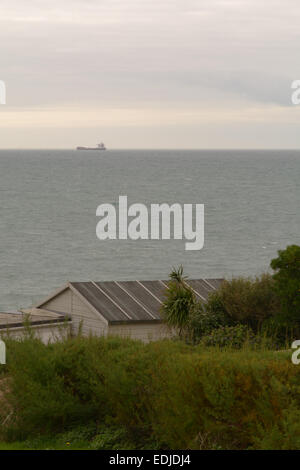 Large ship in sea passing Gunwalloe beach in Gunwalloe, Cornwall ...