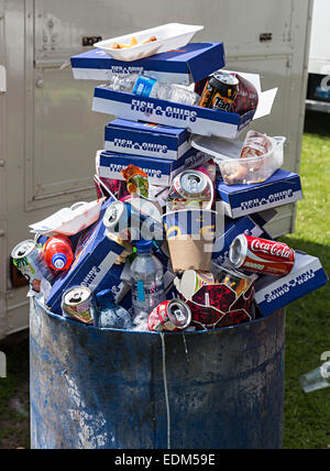 waste overflowing bin full of fast food litter Stock Photo - Alamy